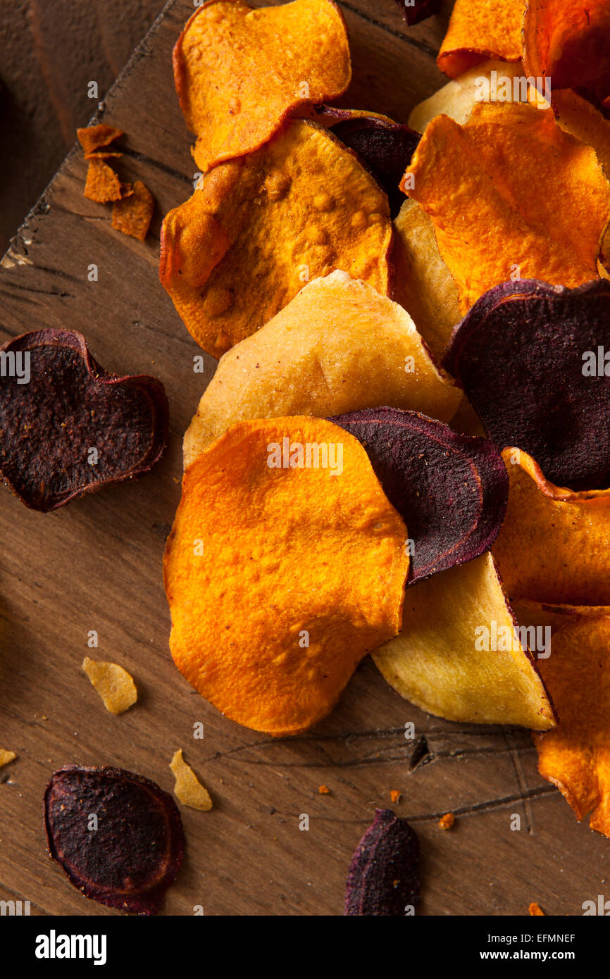 Healthy Homemade Vegetable Chips on a Cutting Board Stock Photo - Alamy