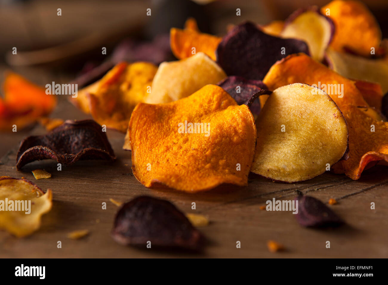Healthy Homemade Vegetable Chips on a Cutting Board Stock Photo - Alamy