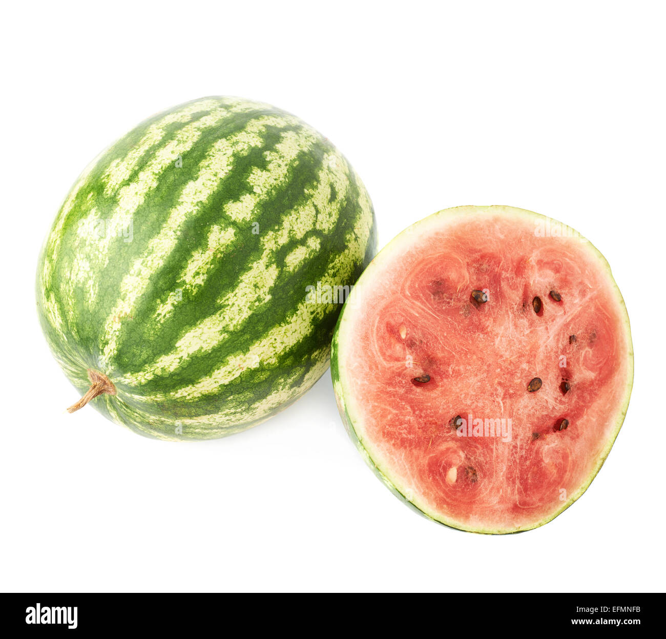 Whole watermelon next to a slice Stock Photo - Alamy
