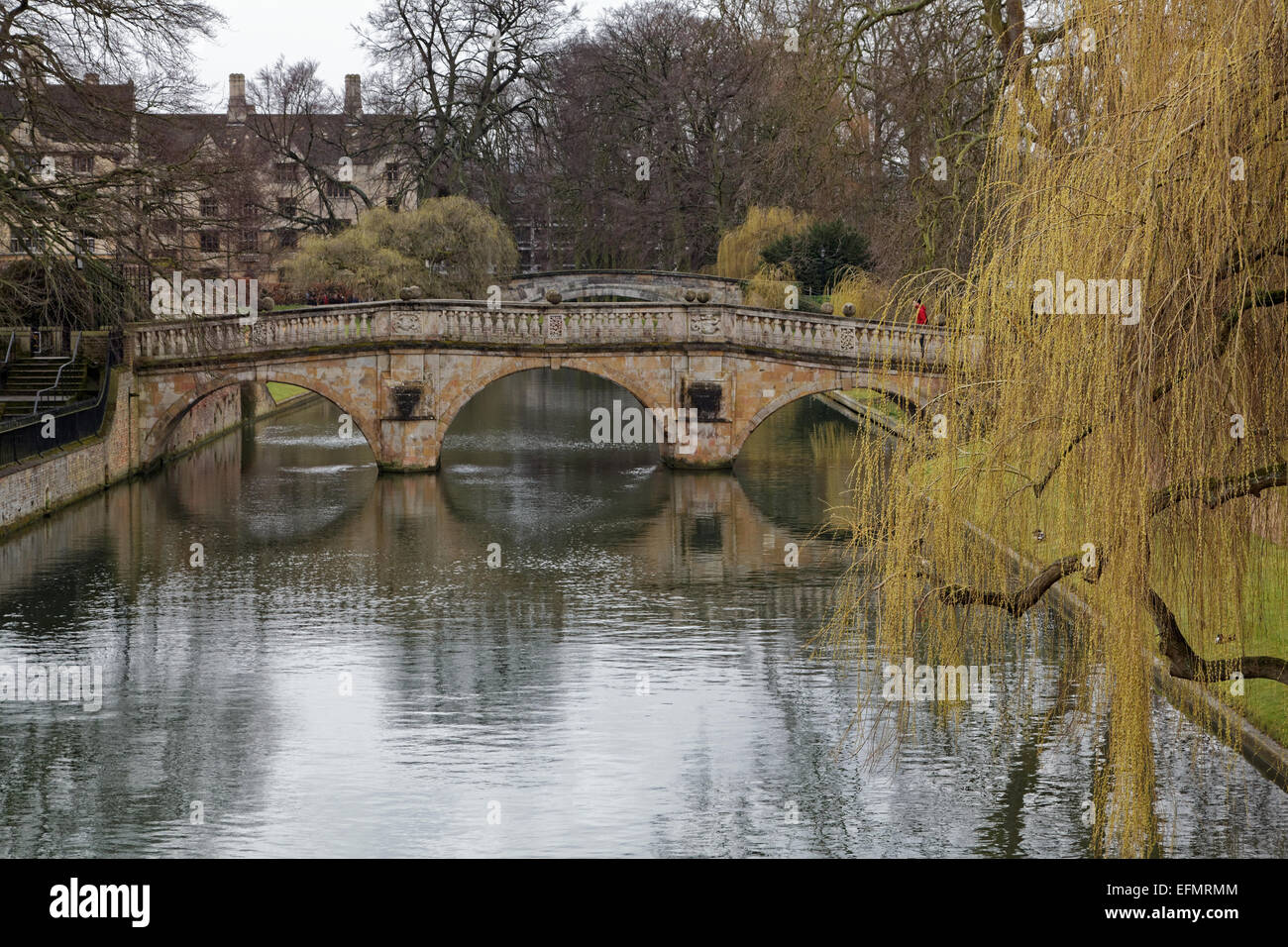 People stroll across a bridge at the River Cam, Cambridge, England, UK ...