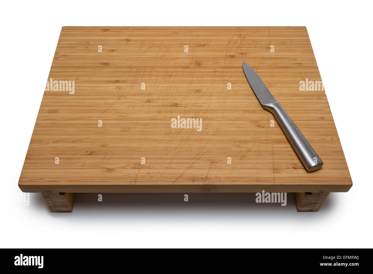 used cutting board with silver kitchen knife isolated on white ...
