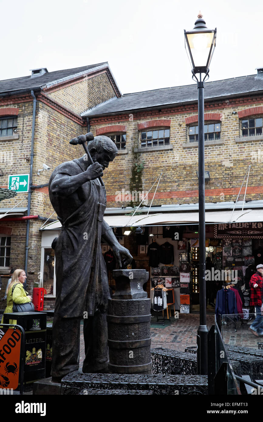 Bronze blacksmith statue, Camden Stables Market, London, UK Stock Photo ...