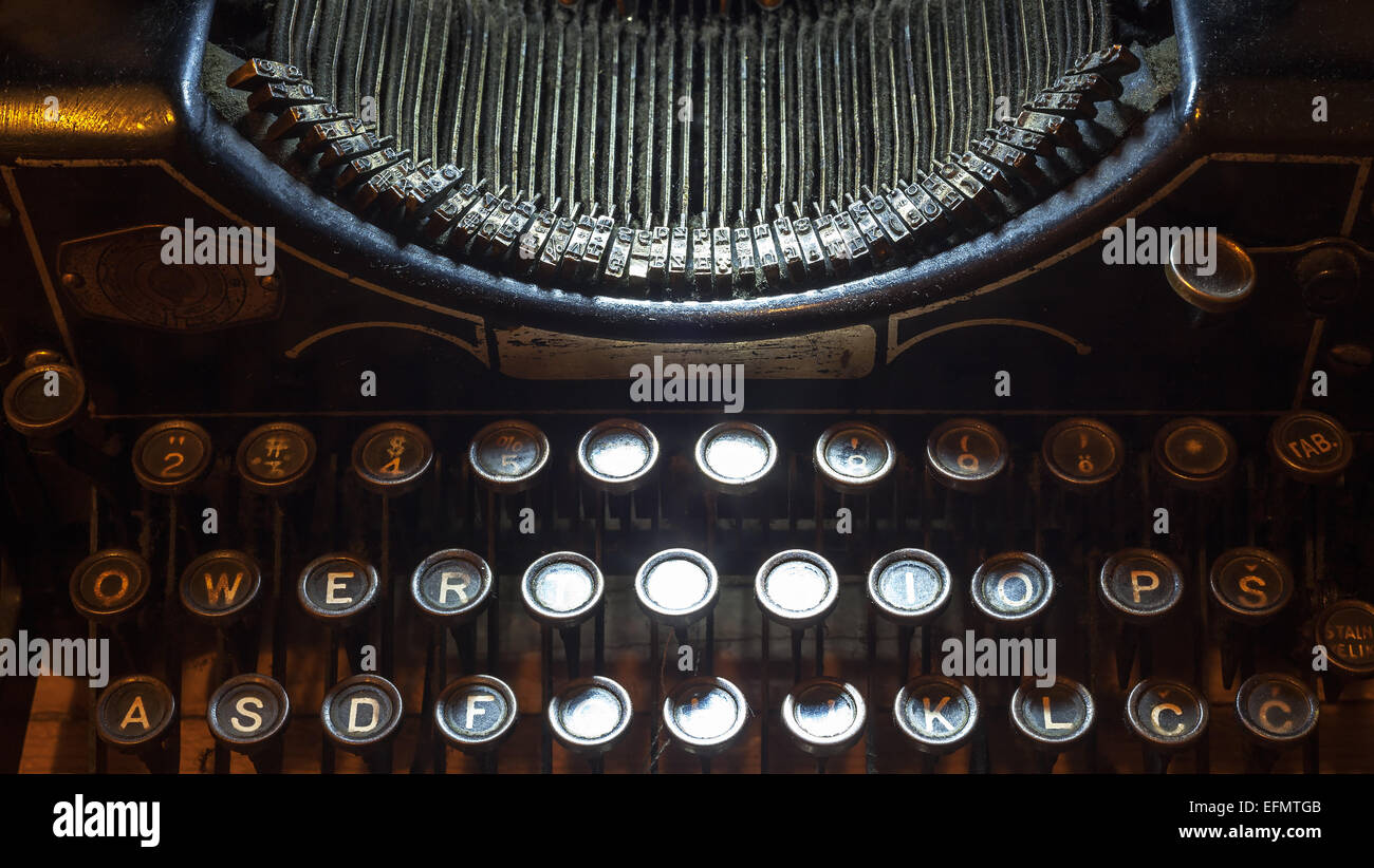 Details of an old typewriting machine, retro style with dusty metal and ...