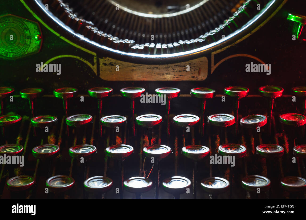 Details of an old typewriting machine, retro style with dusty metal and ...