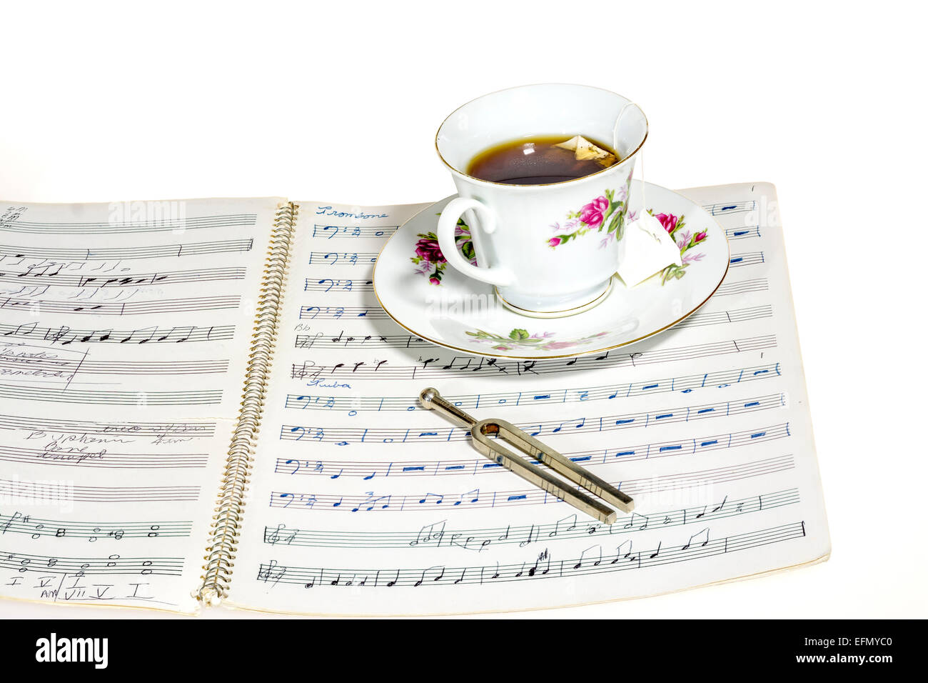 Written music notes and a cup of tea Stock Photo - Alamy