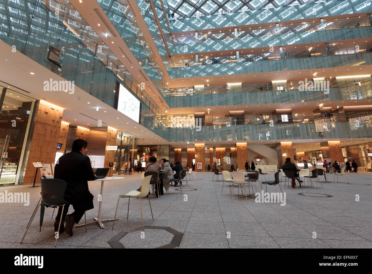 Japan Post (JP) Tower shopping mall with glass roof in Maranouchi ...