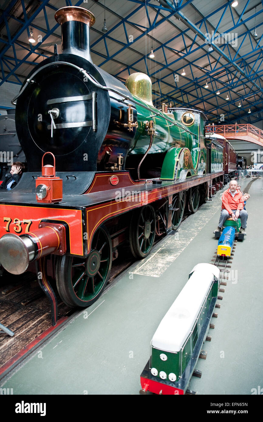 Scale model train used for children's rides is dwarfed by the real ...