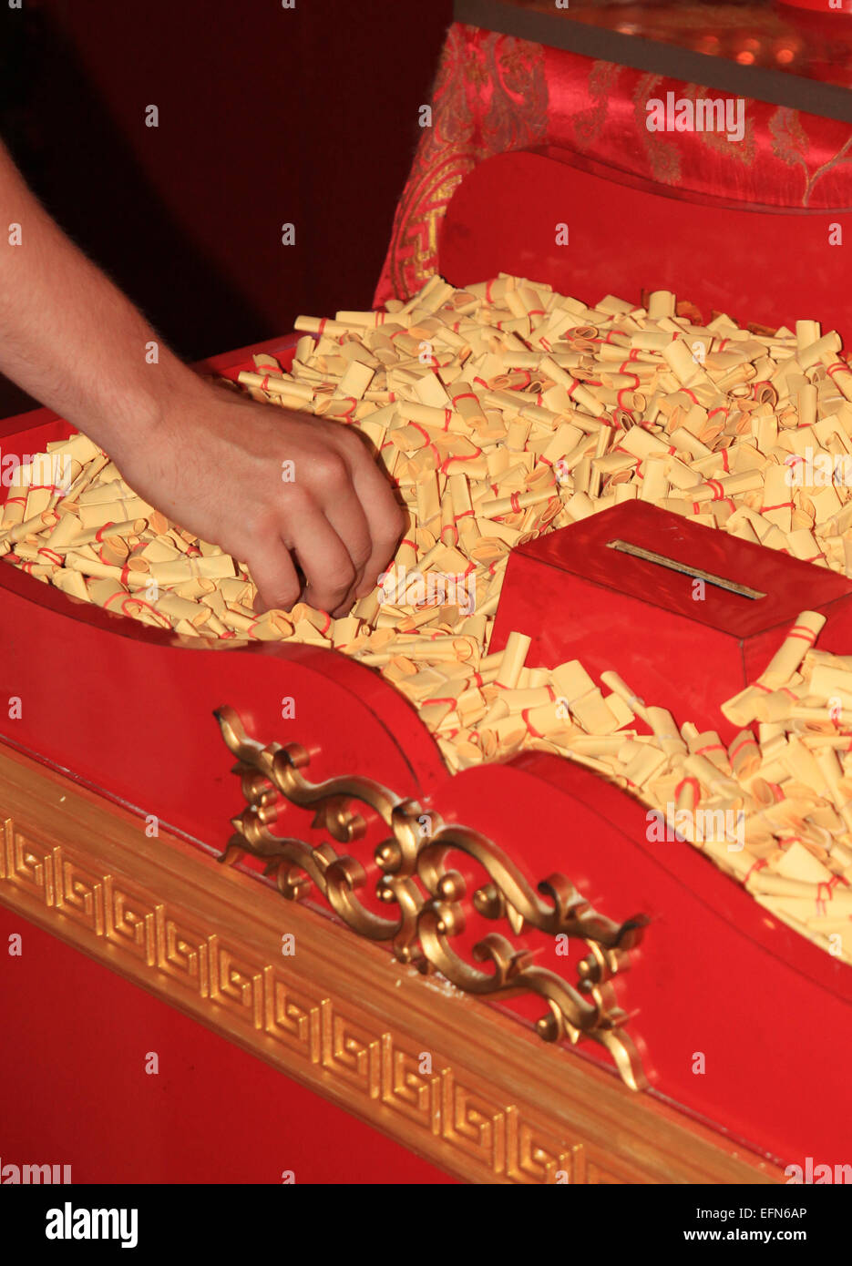 A man's hand is taking a fortune note Stock Photo - Alamy