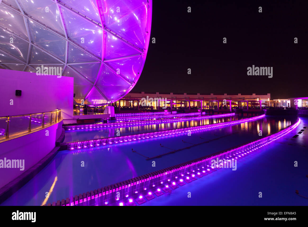 Ferrari World Theme Park illuminated at night Stock Photo - Alamy