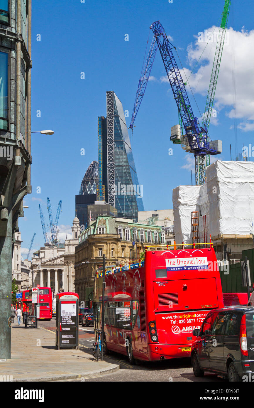 Traffic on Queen Victoria Street passes Bloomberg Place construction ...