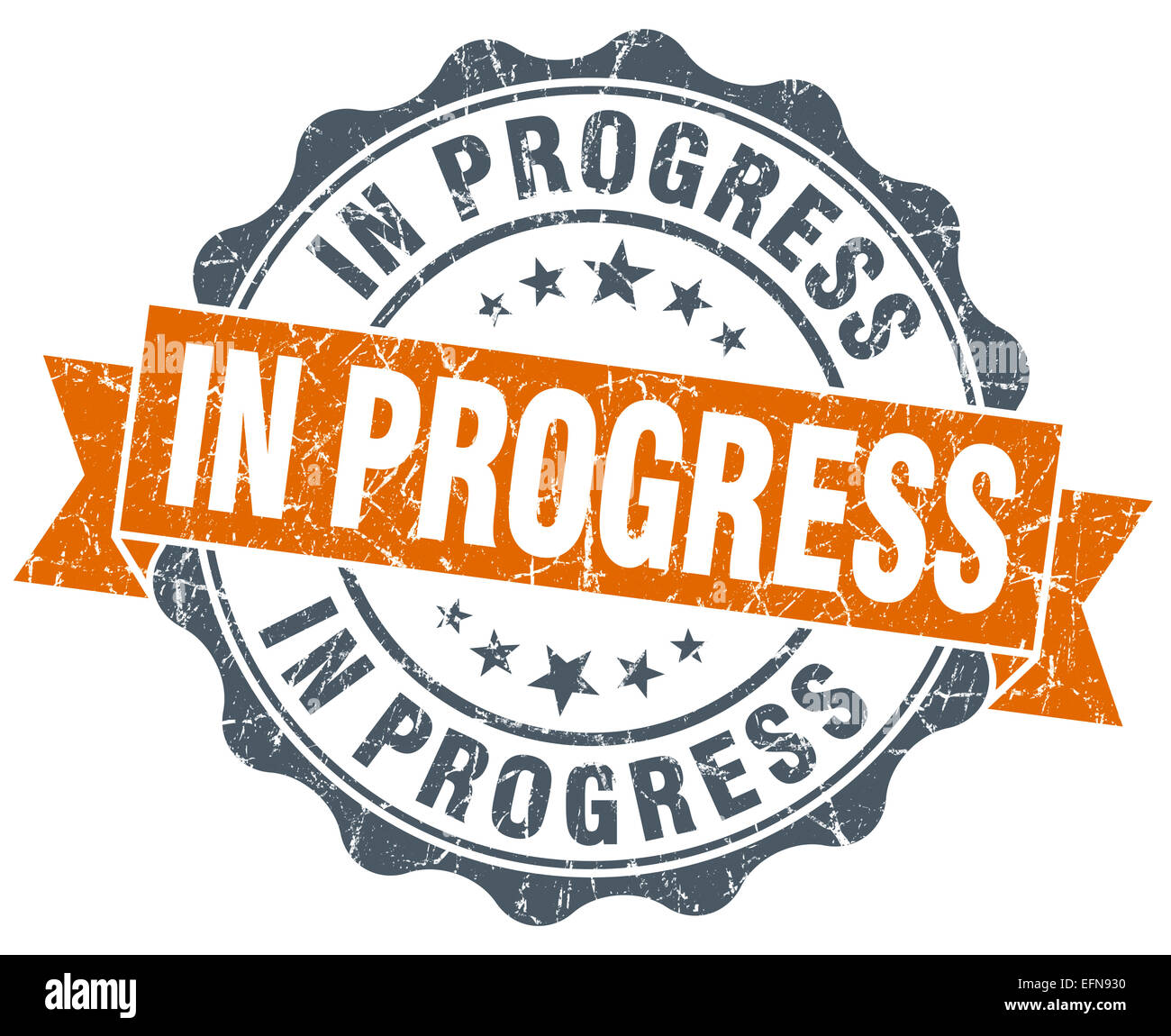 in progress vintage orange seal isolated on white Stock Photo - Alamy