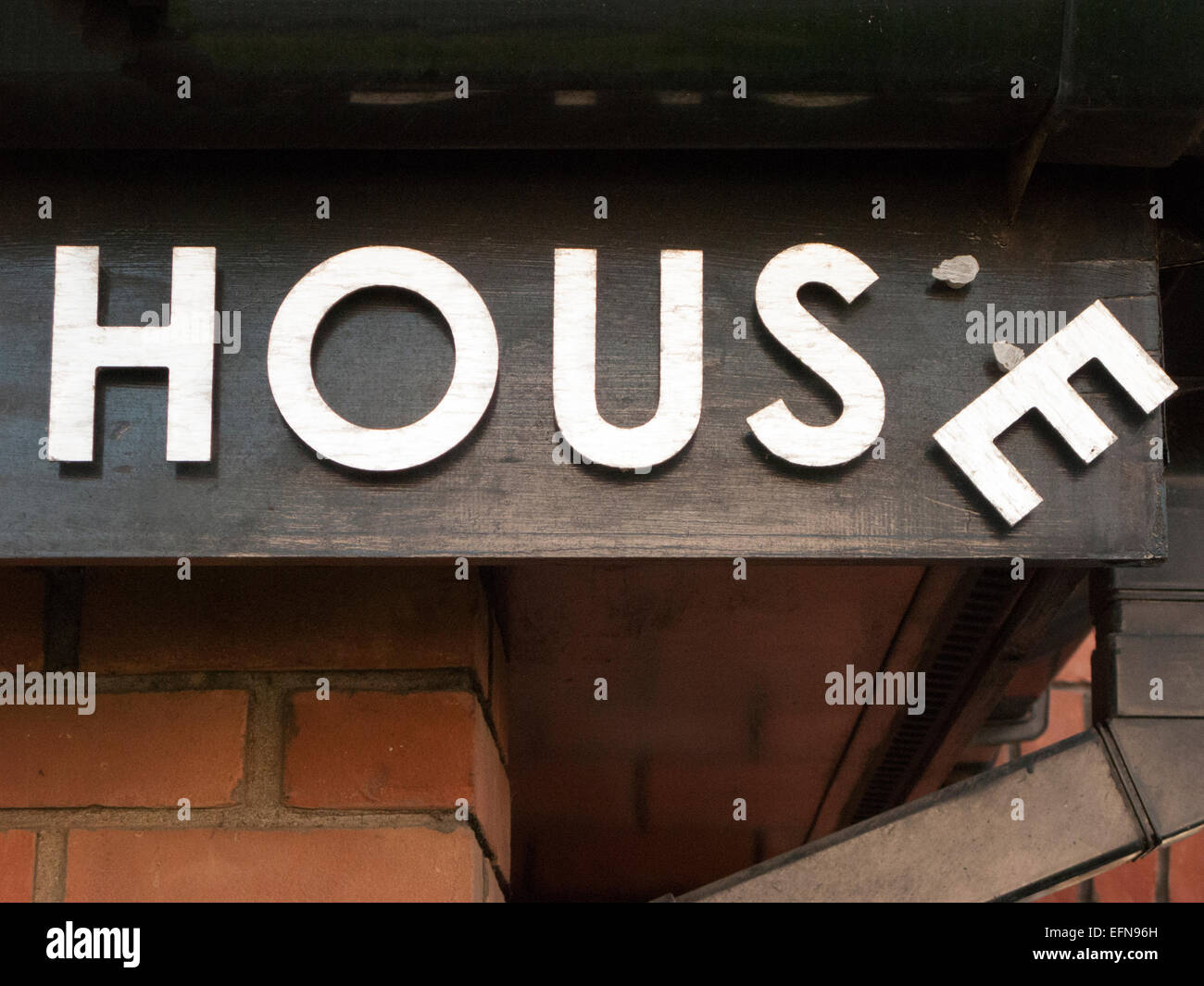 Name letters on a 'house' building which dislodged / slipped and which ...