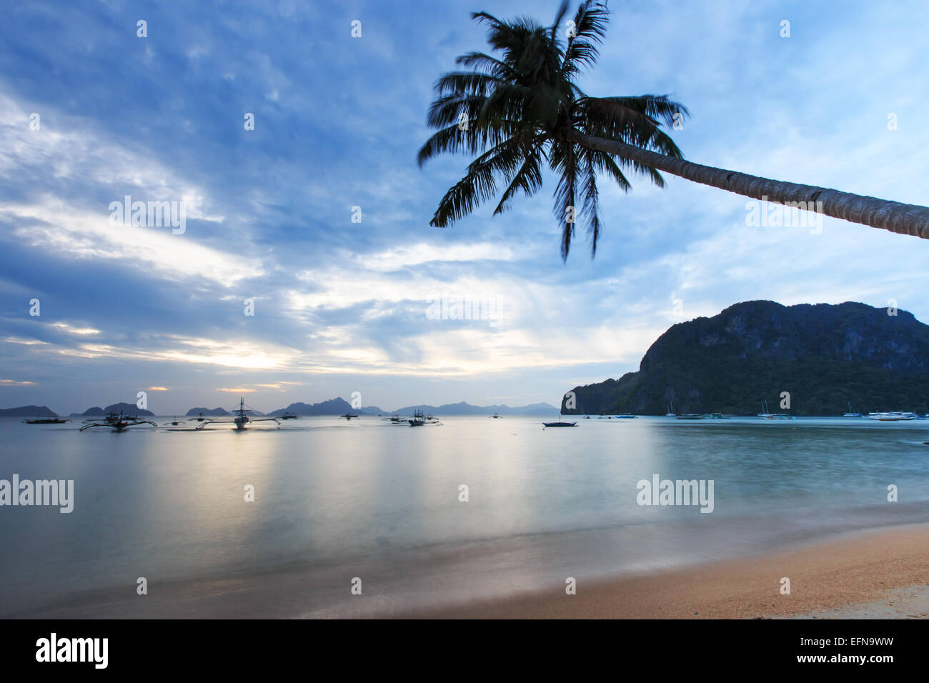 Sunset at Corong Corong beach, Palawan, Philippines Stock Photo - Alamy