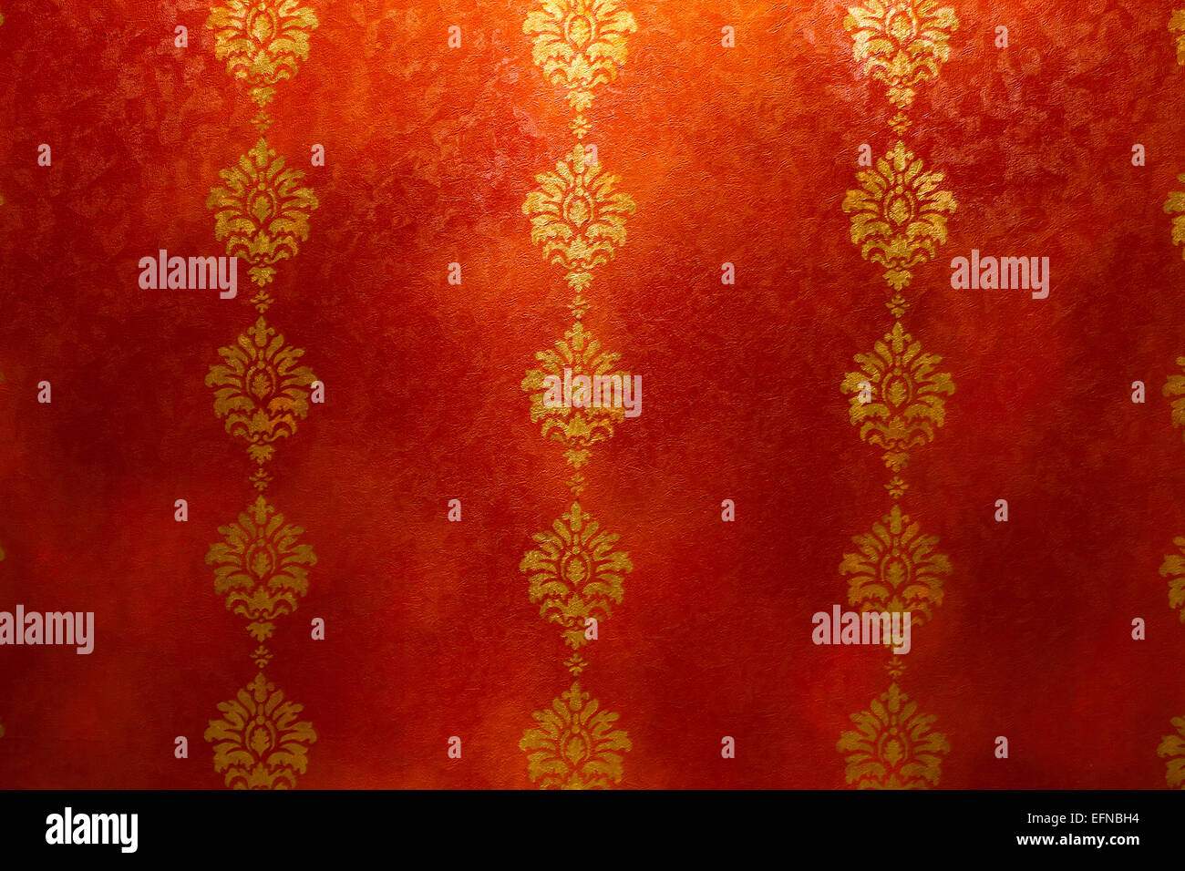red wall with gold ornament Stock Photo - Alamy