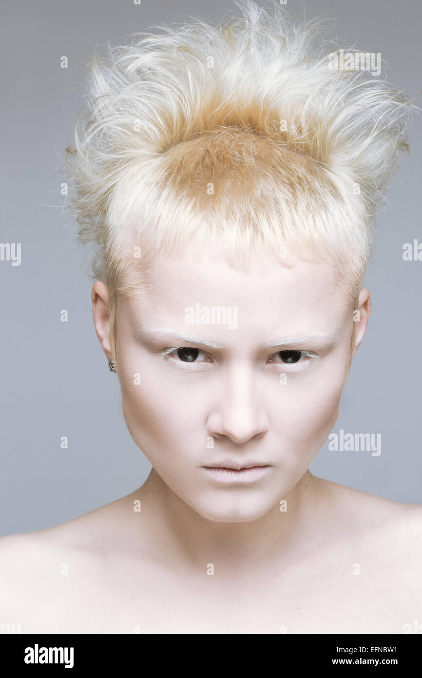 angry aggressive girl in black lenses Stock Photo - Alamy
