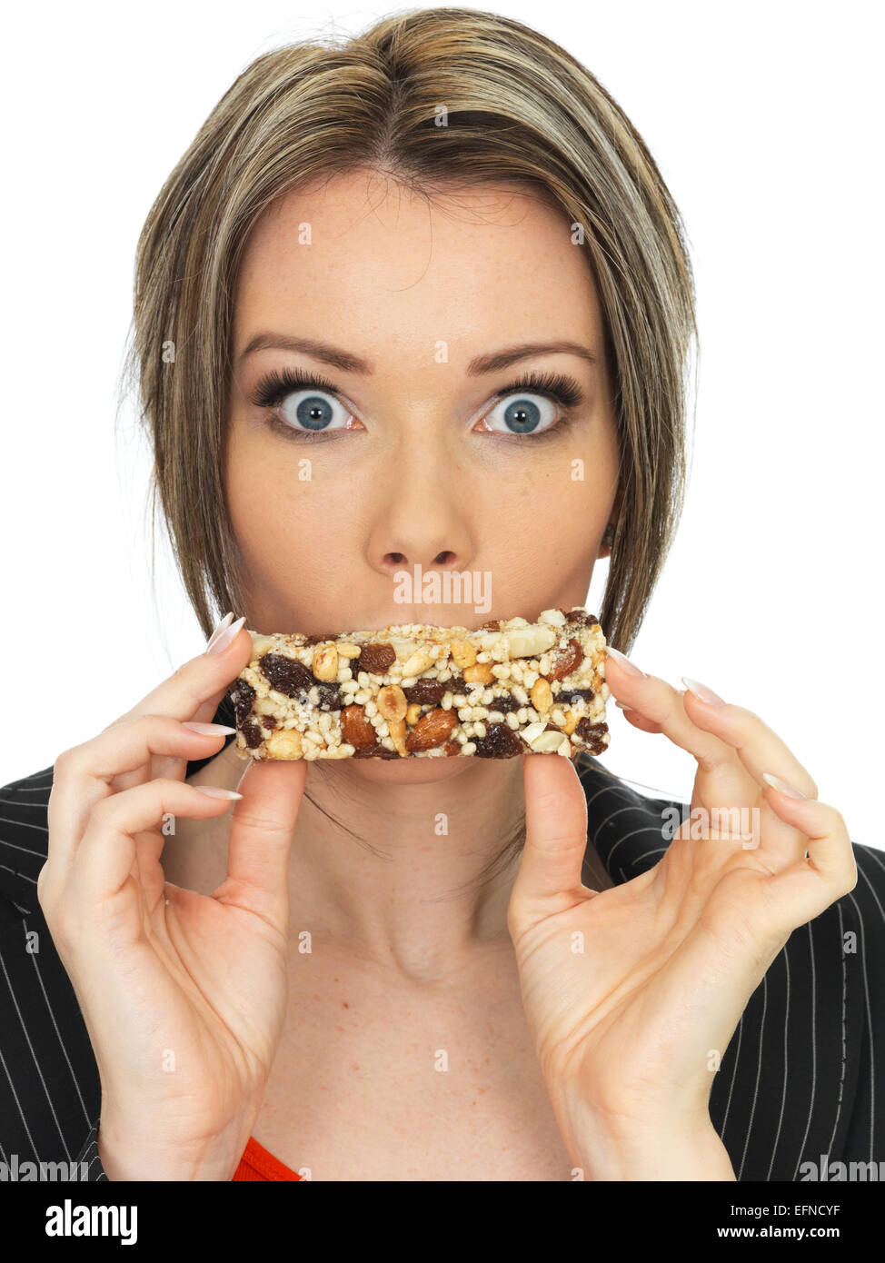 Young Healthy Business Woman Eating a Breakfast Cereal Bar Stock Photo ...