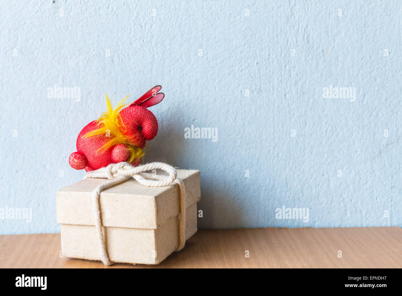 Rabbit on the gift box Stock Photo - Alamy