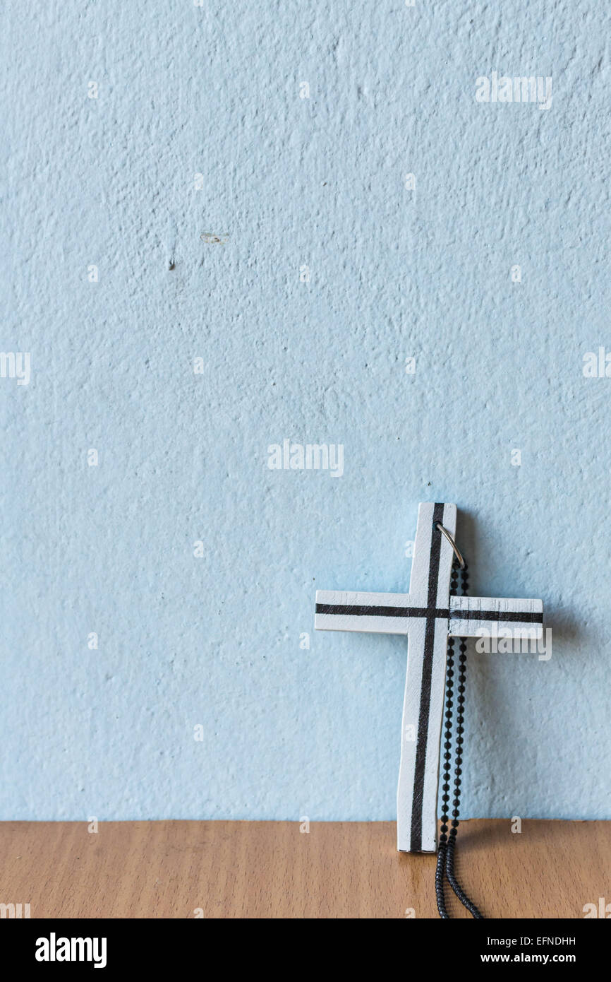 The cross is leaning against the wall Stock Photo - Alamy