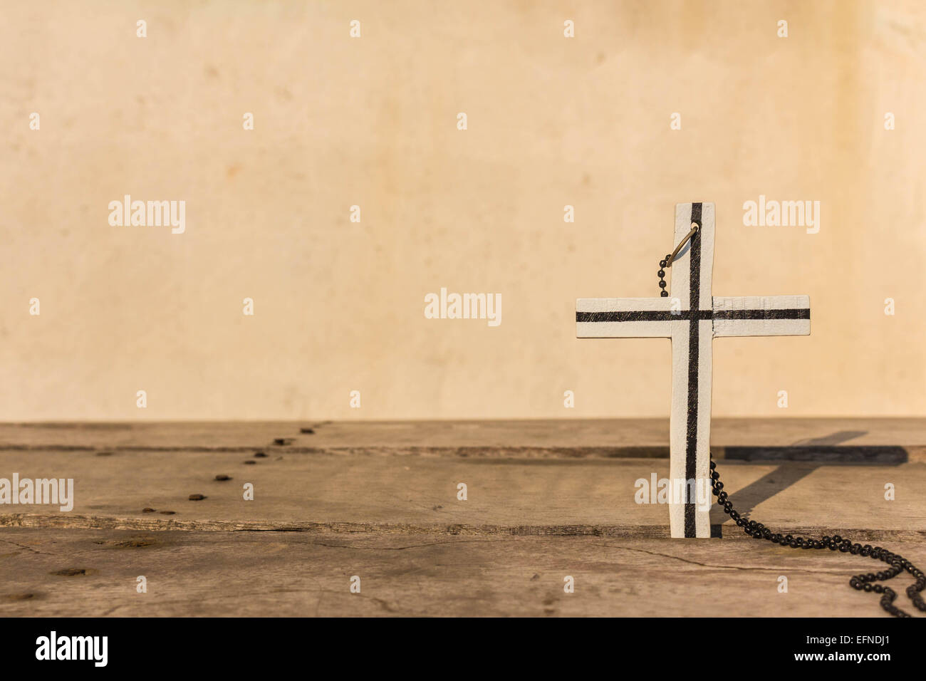 Cross by sunlight during the day Stock Photo - Alamy