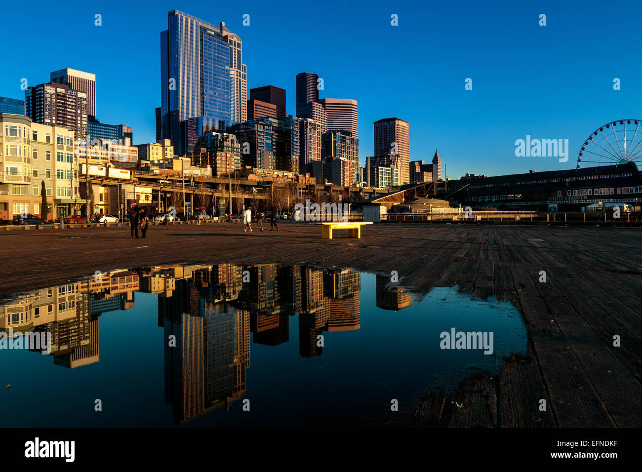 Seattle waterfront with the skyscrapers reflecting on a water Stock ...