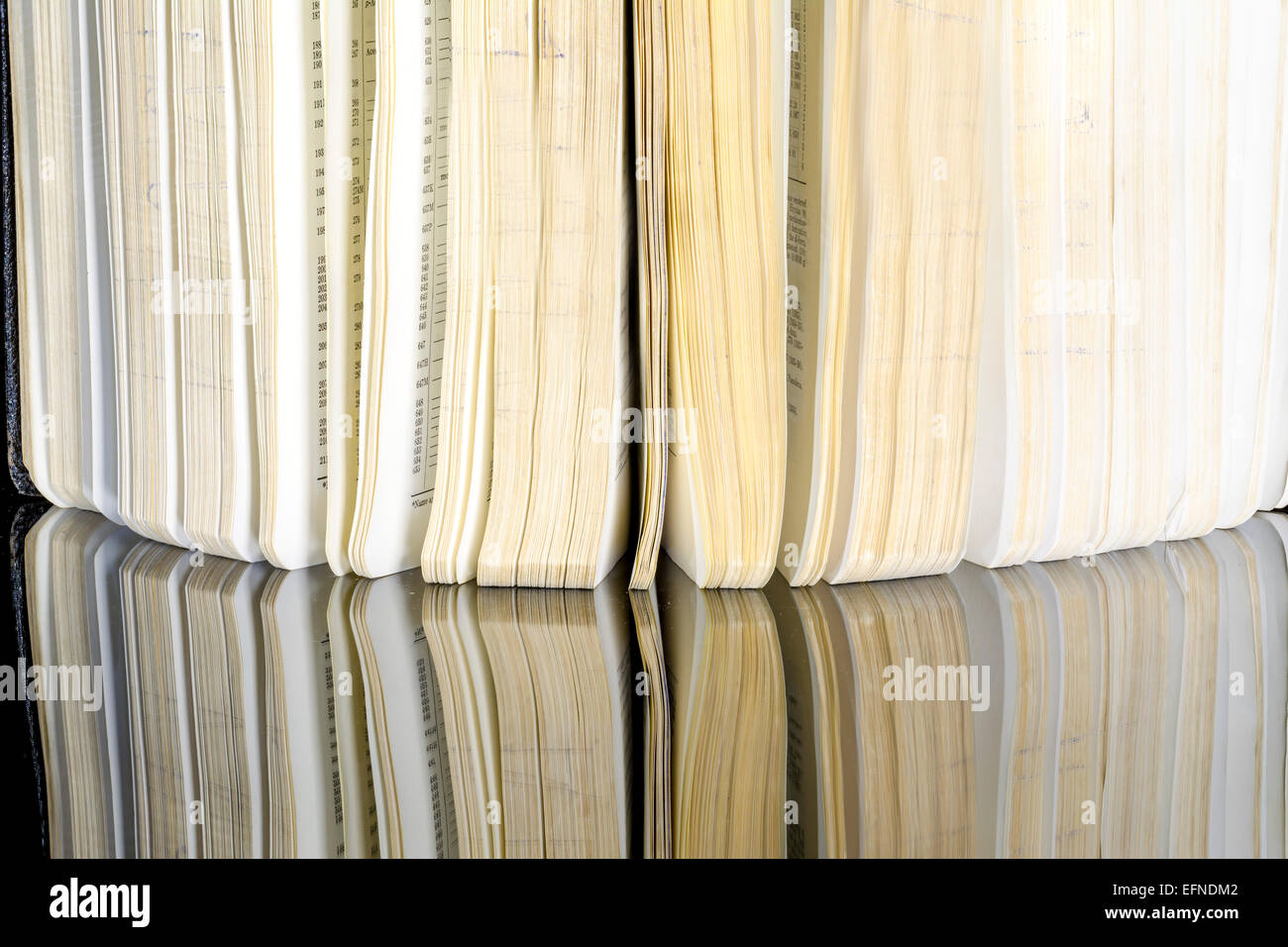 Yellow Pages of an old book Stock Photo - Alamy