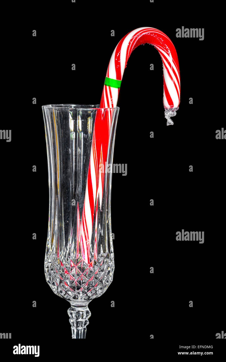 Single Candy cane in a fancy glass Stock Photo - Alamy