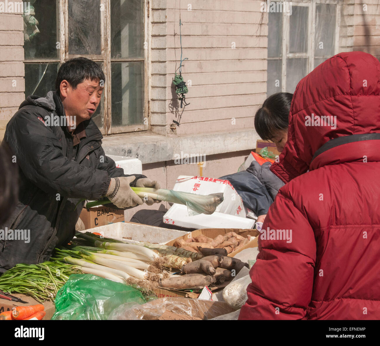 Outdoor street market for vegetables, Dalian China Stock Photo - Alamy