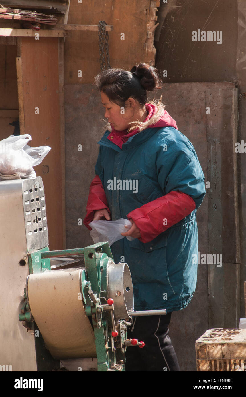 Outdoor street market for vegetables, Dalian China Stock Photo - Alamy