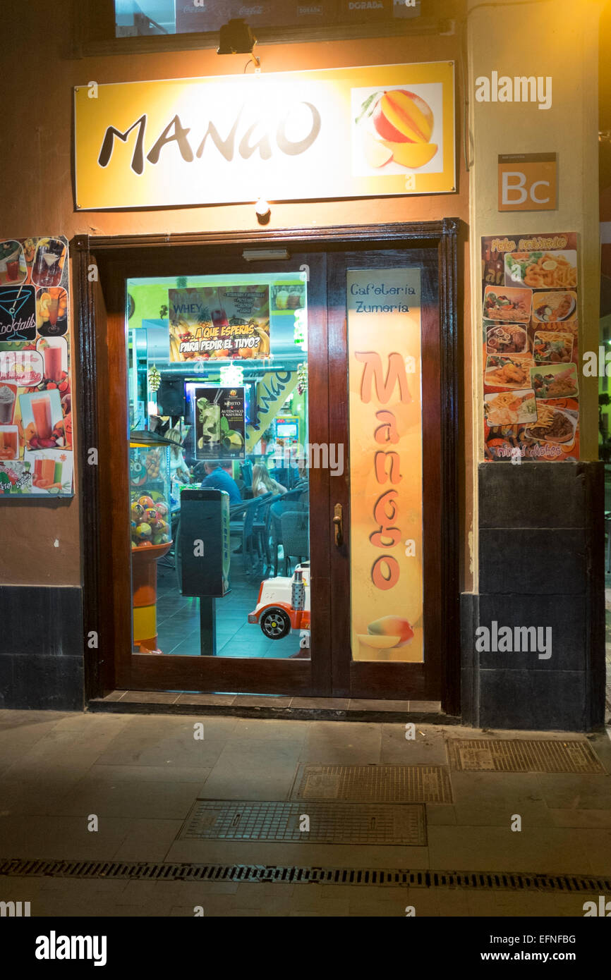External, nighttime view of cafe and snack bar, El Medano, Tenerife ...