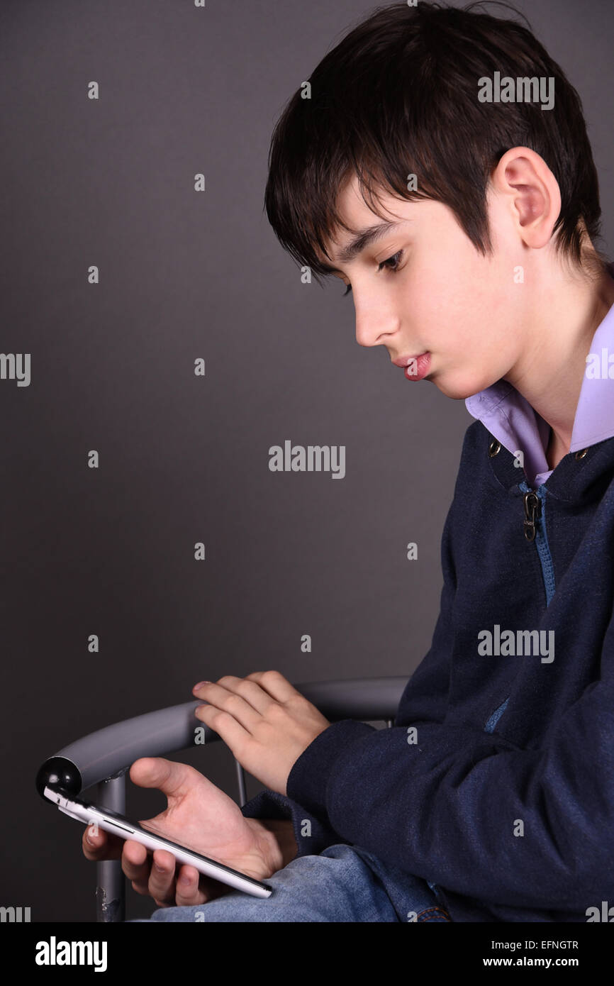 boy with a smartphone Stock Photo - Alamy