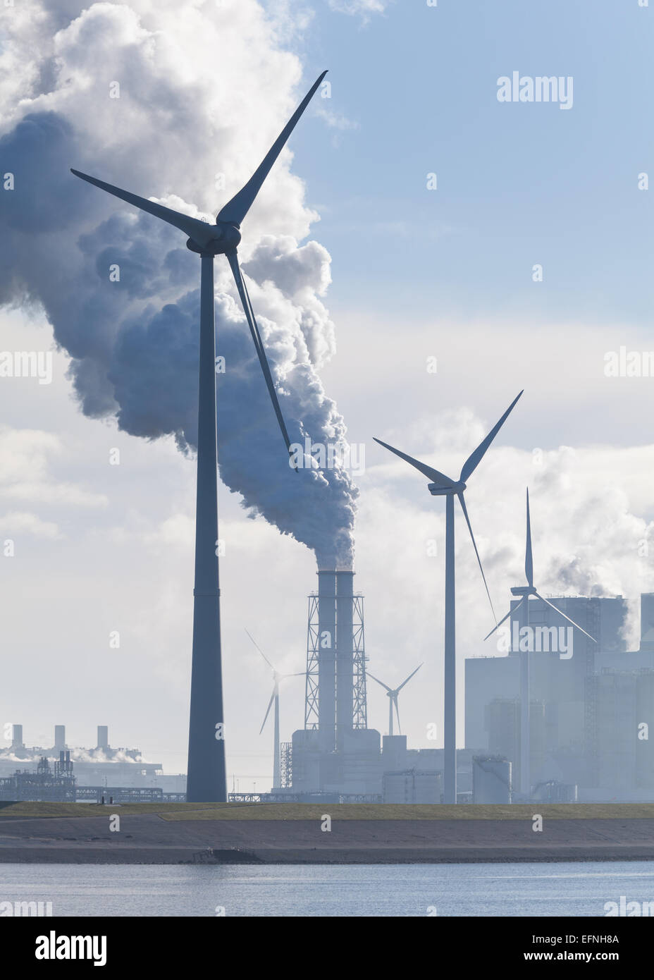 Wind turbines and the RWE Power Plant at dawn in Eemshaven, Netherlands ...