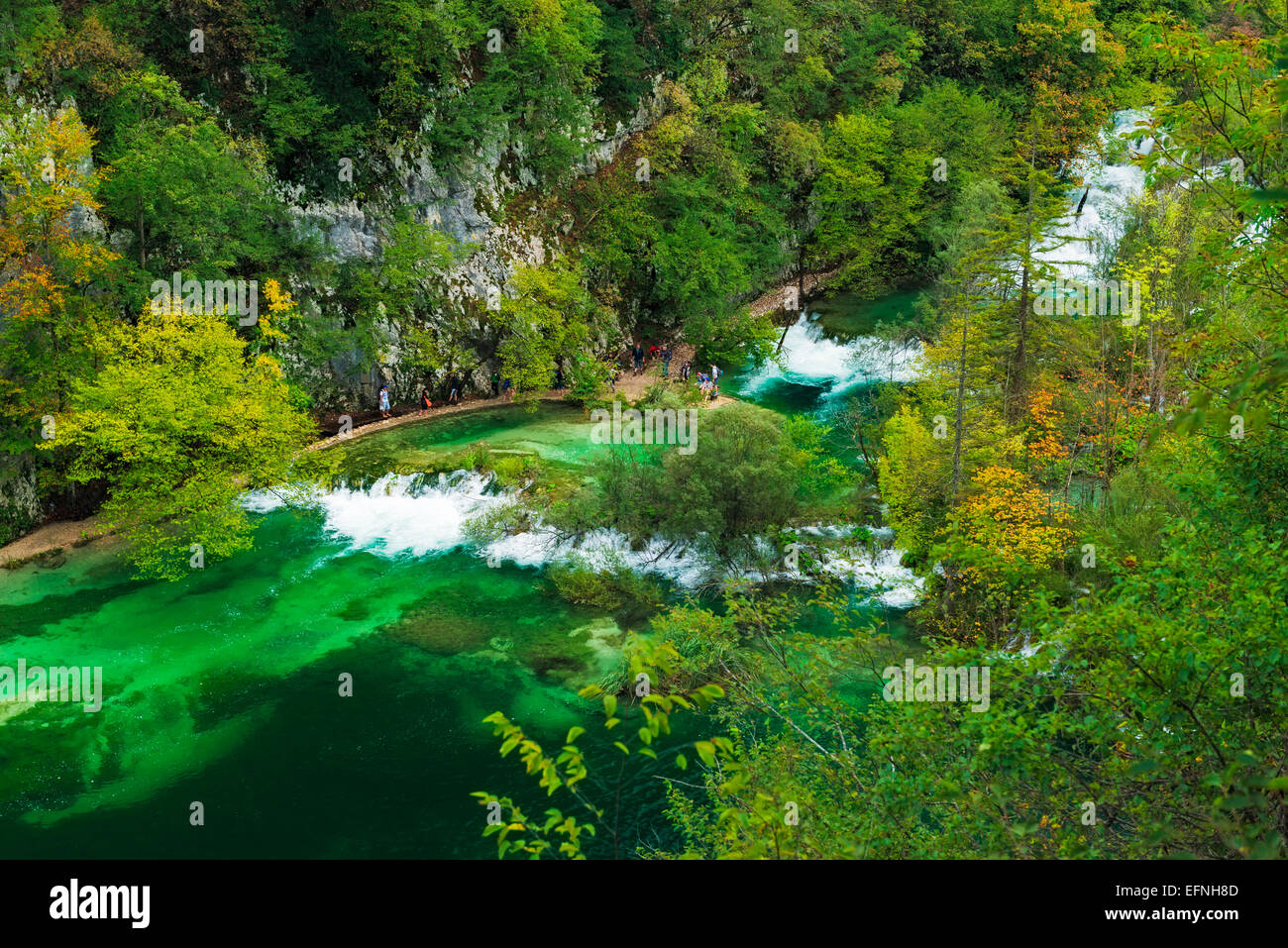 Travertine cascades and boardwalk on the Korana River, Plitvice Lakes ...