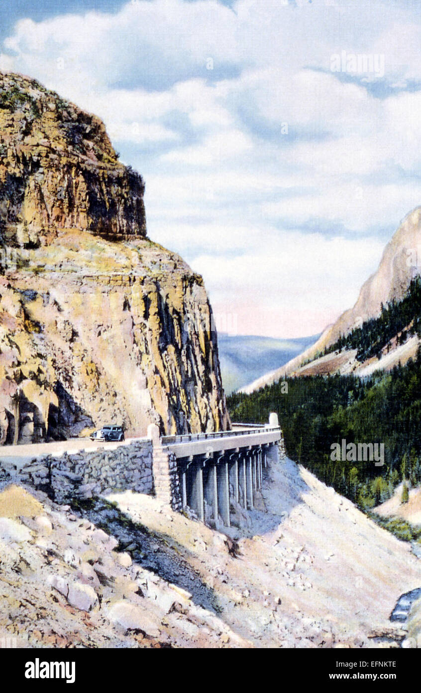 Golden Gate, Yellowstone National Park, with an automobile in the scene ...