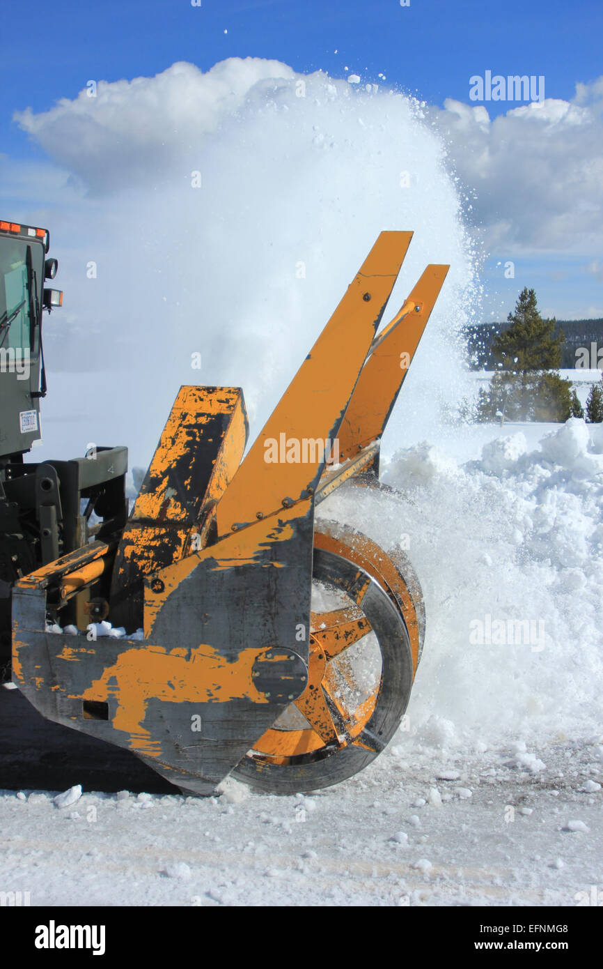 A snow blower operates in Hayden Valley, clearing snow on April 3, 2013 ...