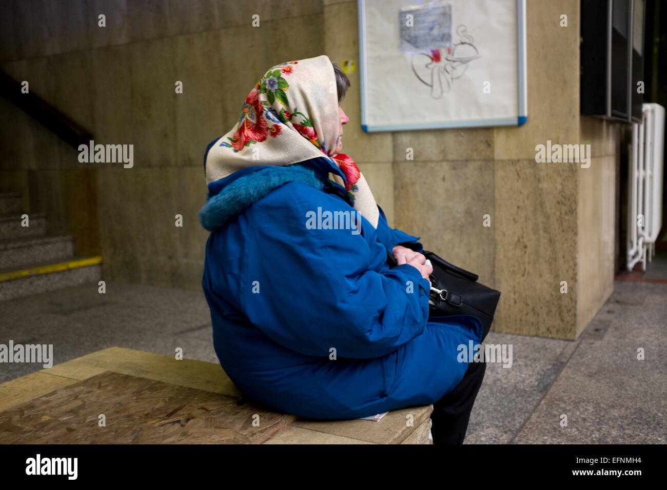 old lady waiting for a train in slovakia Stock Photo - Alamy