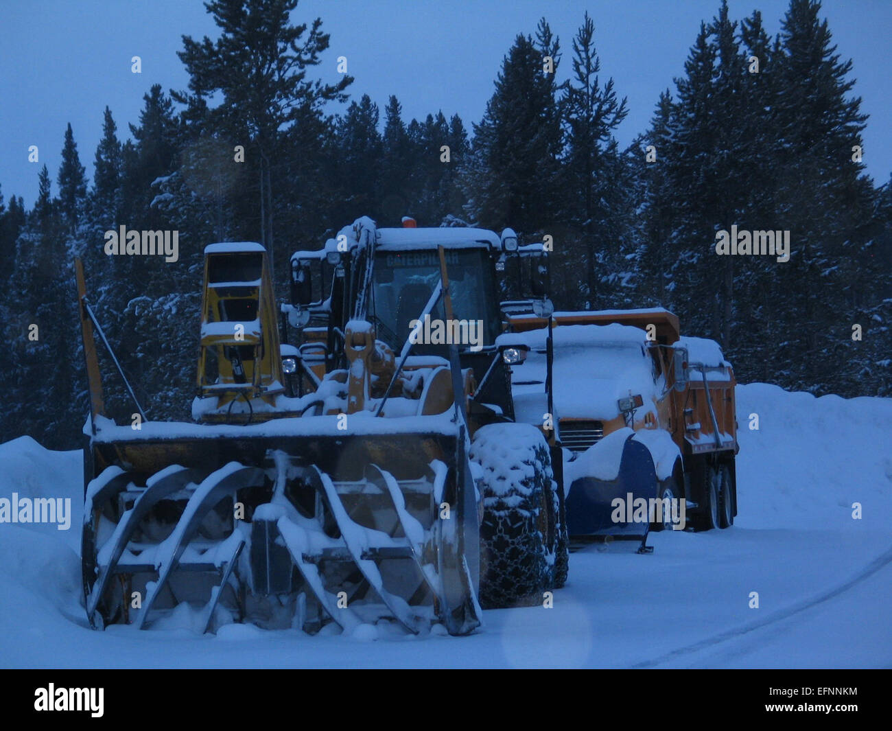 A plow truck and blower are seen at Fishing Bridge in Yellowstone ...