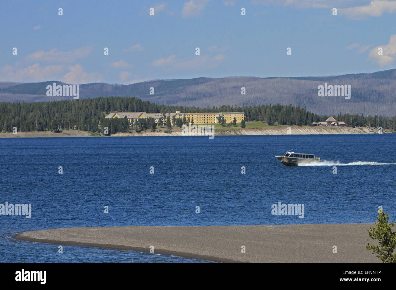 A scenic cruiser travels on Yellowstone Lake, offering visitors ...