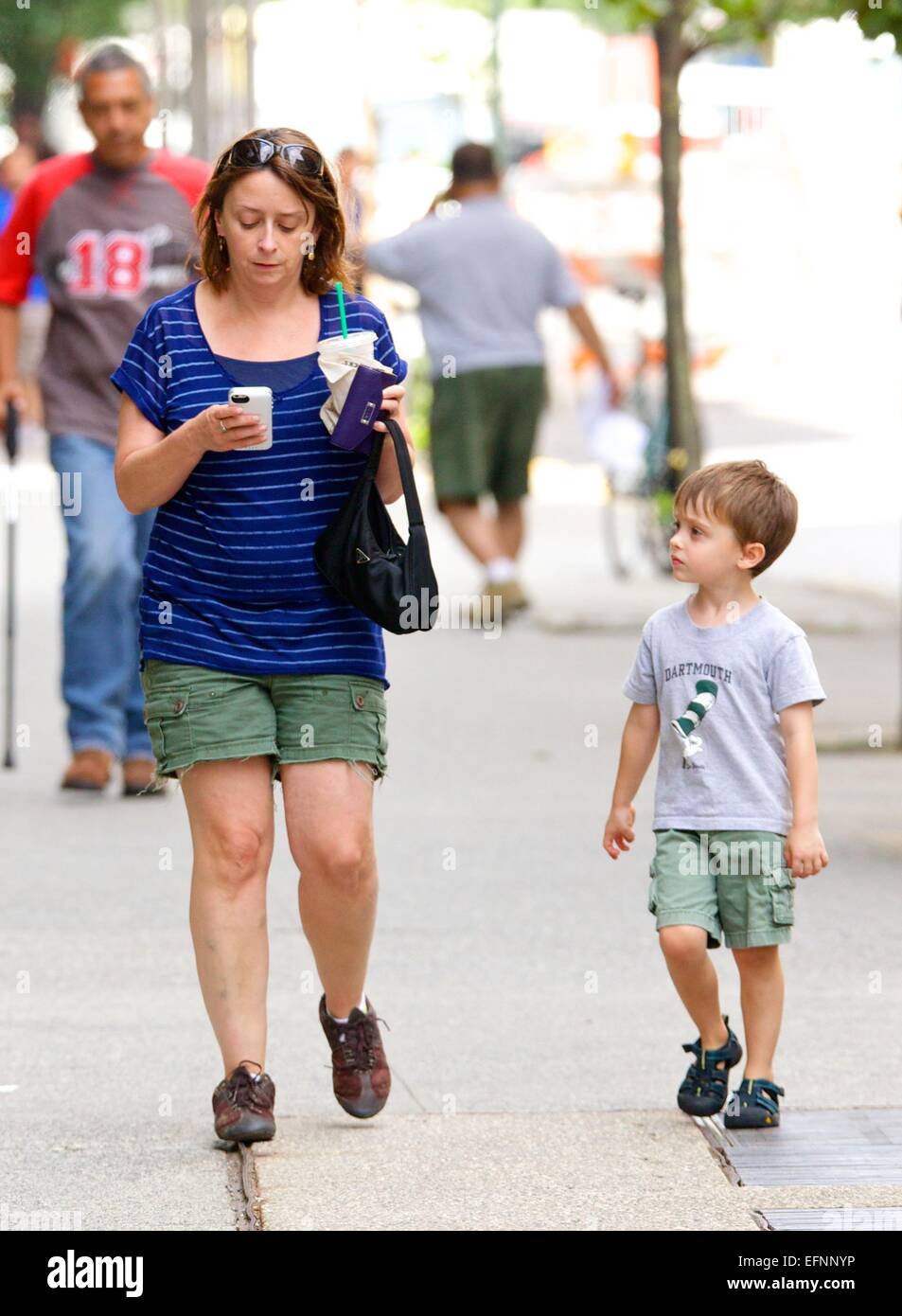 Rachel Dratch, carrying a Starbucks iced coffee, spotted with her son ...