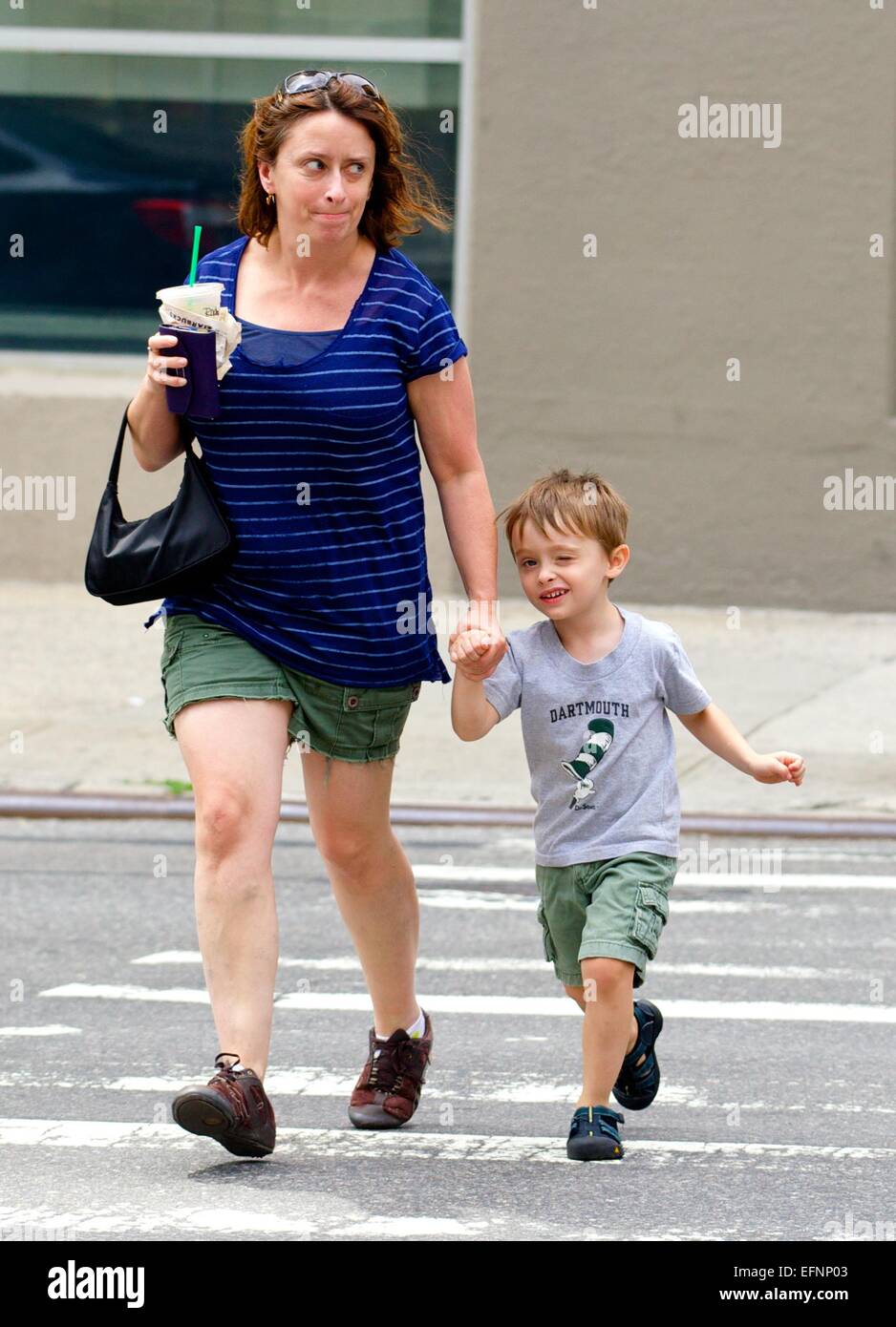 Rachel Dratch, carrying a Starbucks iced coffee, spotted with her son ...
