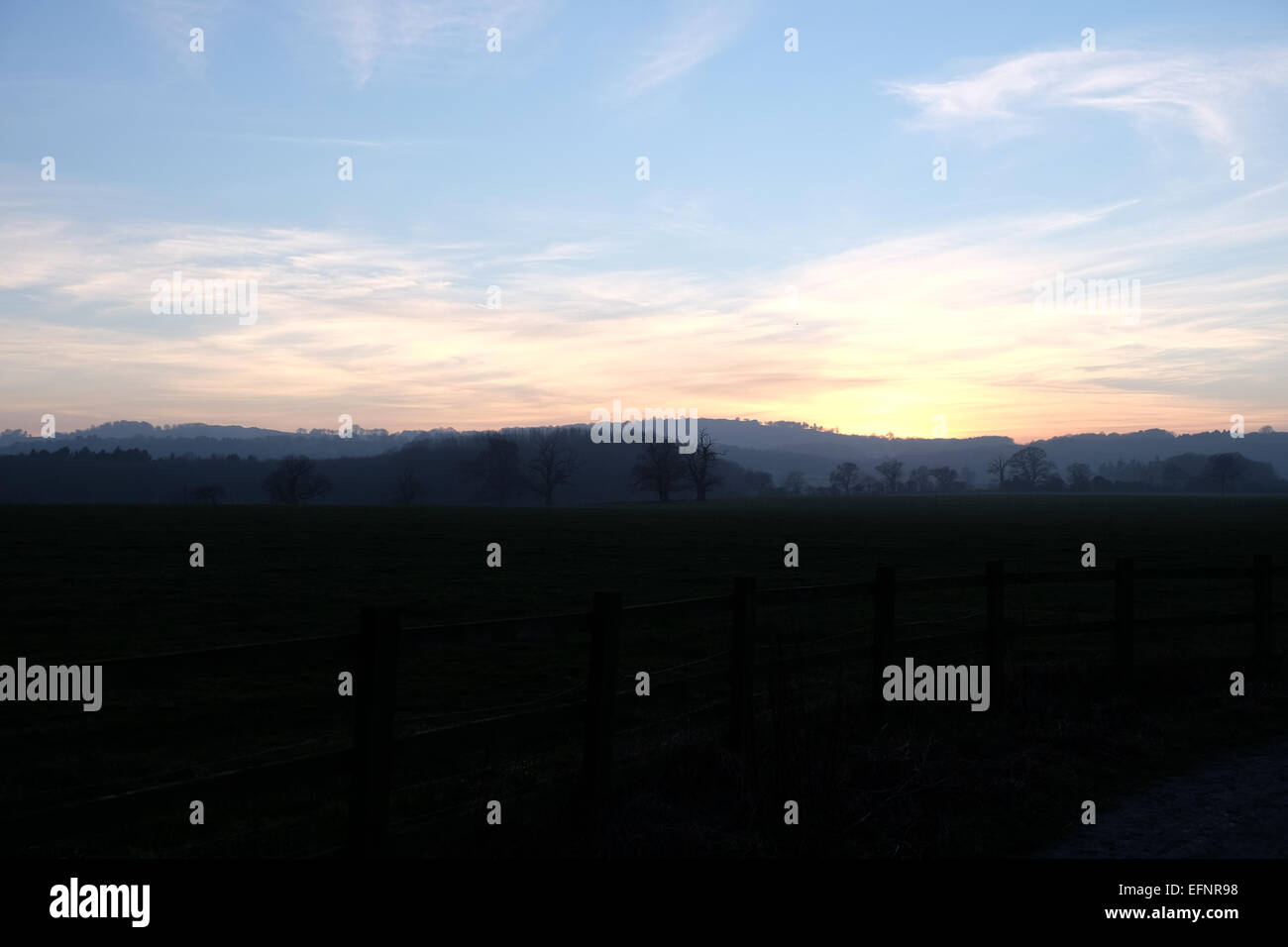 Sunset on a winters day when the sun shined all day Stock Photo - Alamy