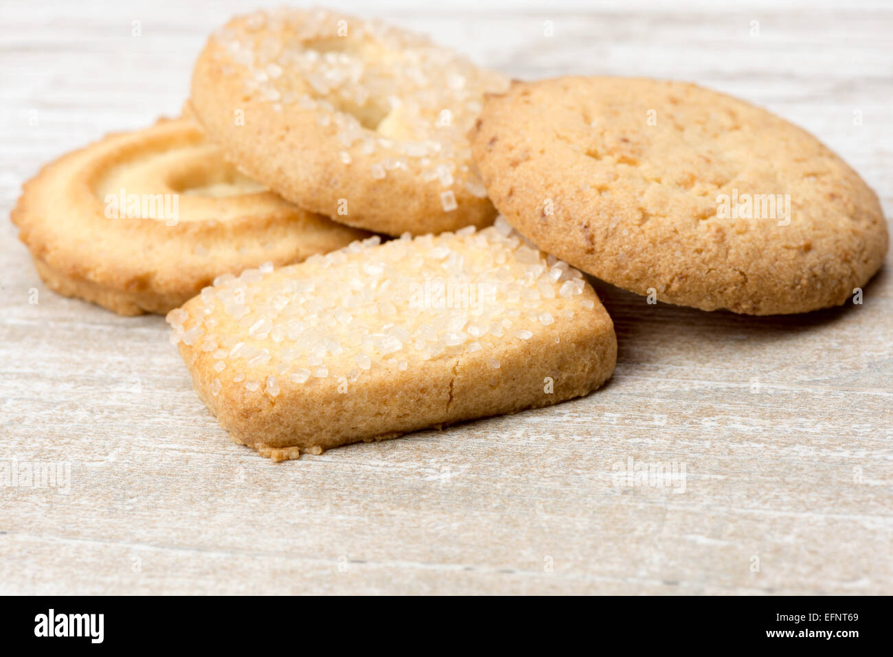 butter cookies of different shapes on the wooden table Stock Photo - Alamy