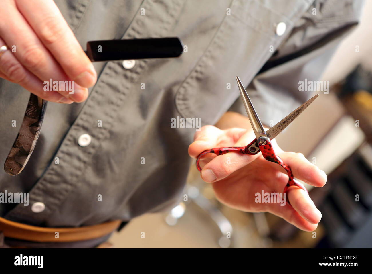 Barber in action hi-res stock photography and images - Alamy