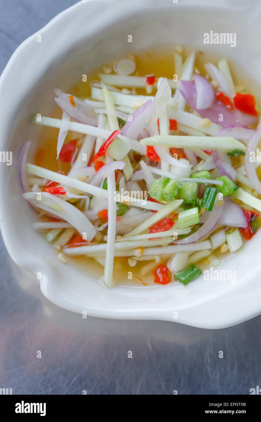 spicy mango salad , asian style food Stock Photo - Alamy