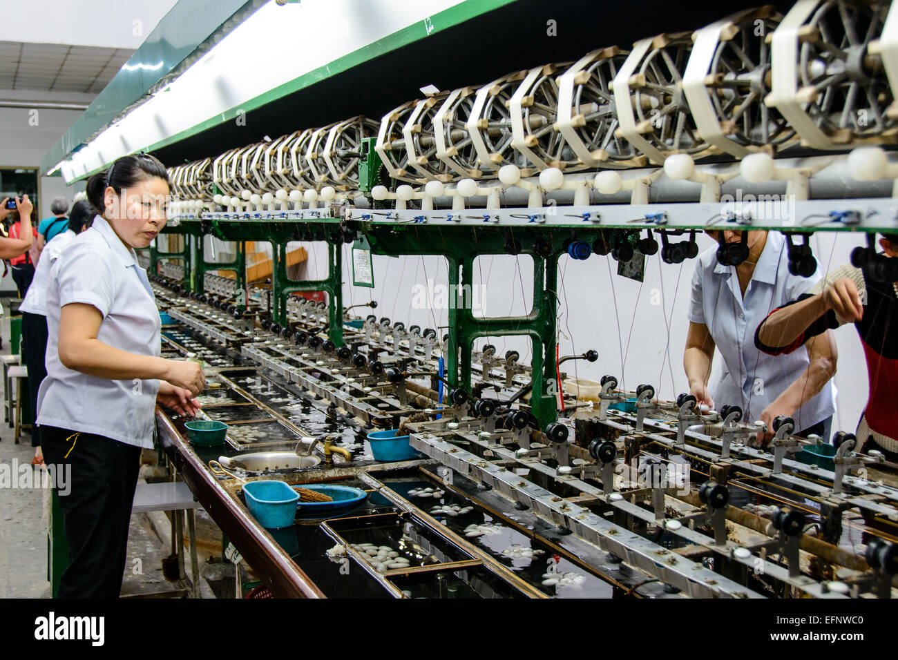 Spinning silk in a factory in Suzhou, China Stock Photo - Alamy