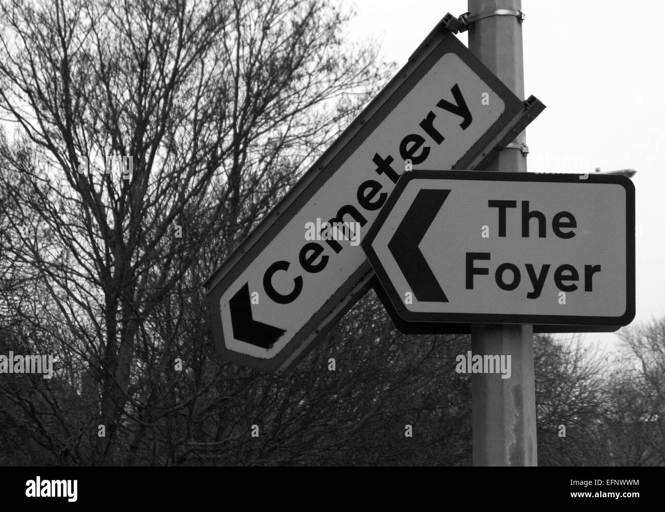 Loose road sign, broken bracket has allowed sign to slip pointing ...