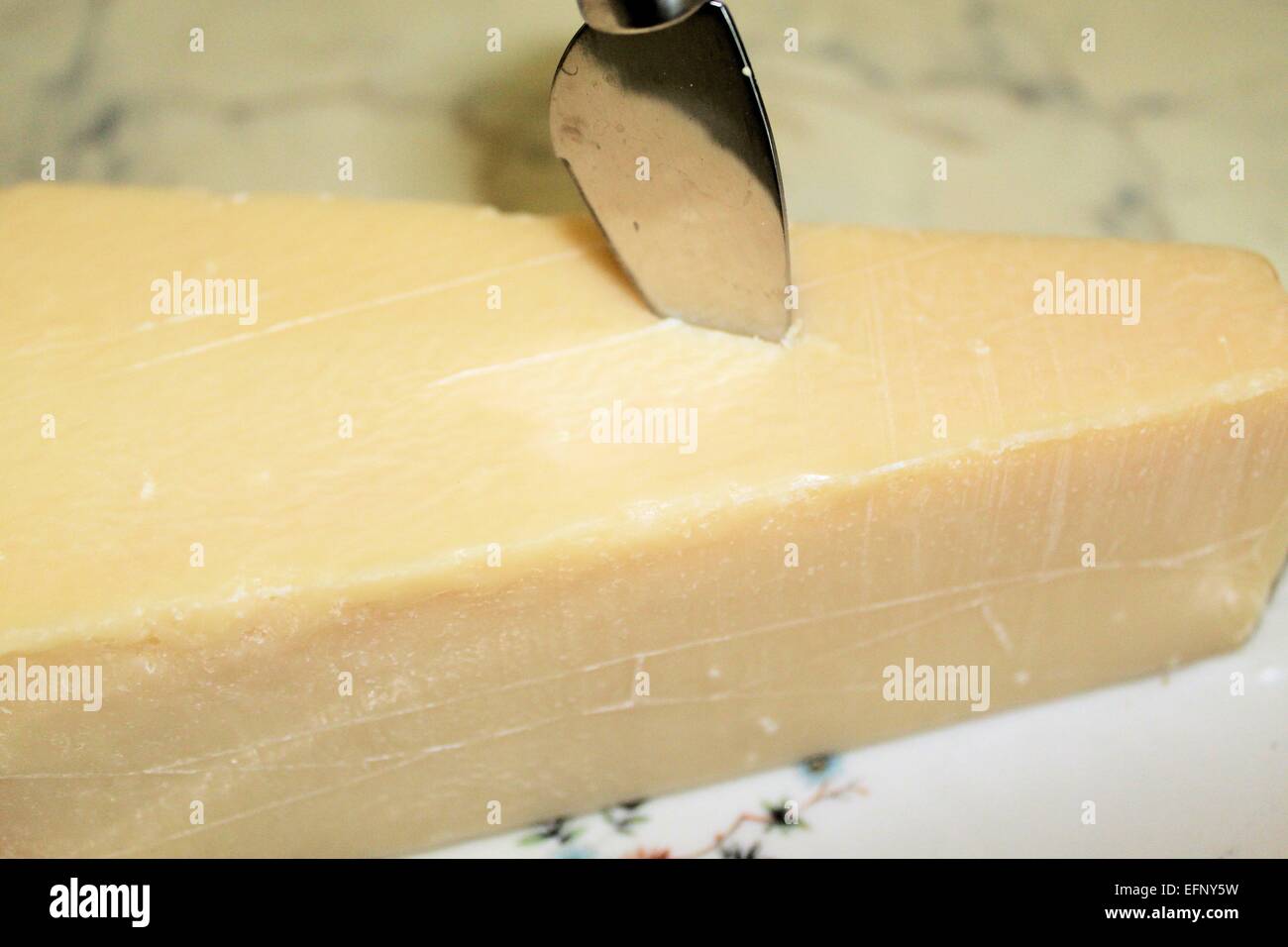 Parmesan cheese with parmesan knife hi-res stock photography and images ...