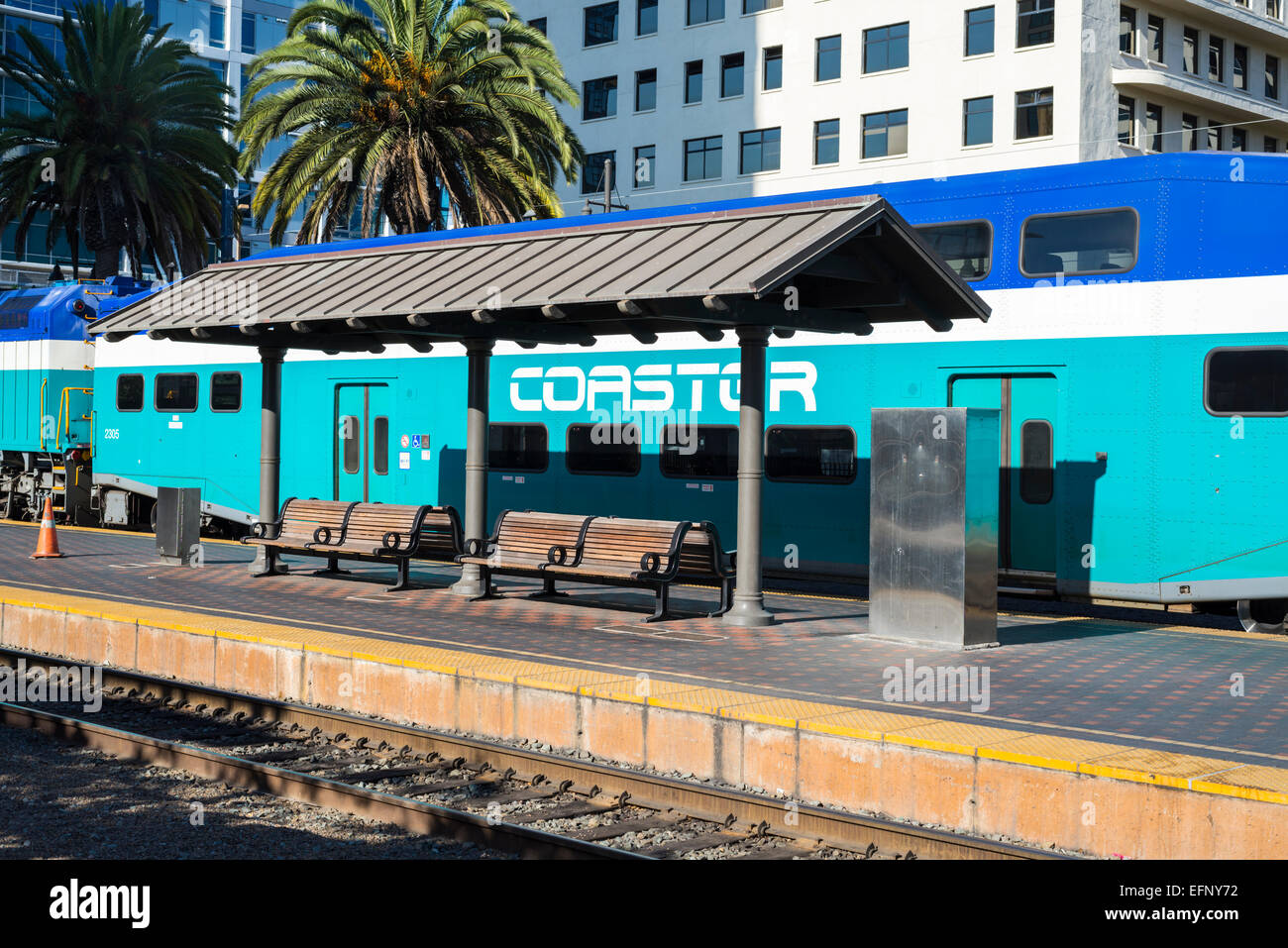 Public benches and the COASTER commuter train. San Diego, California ...