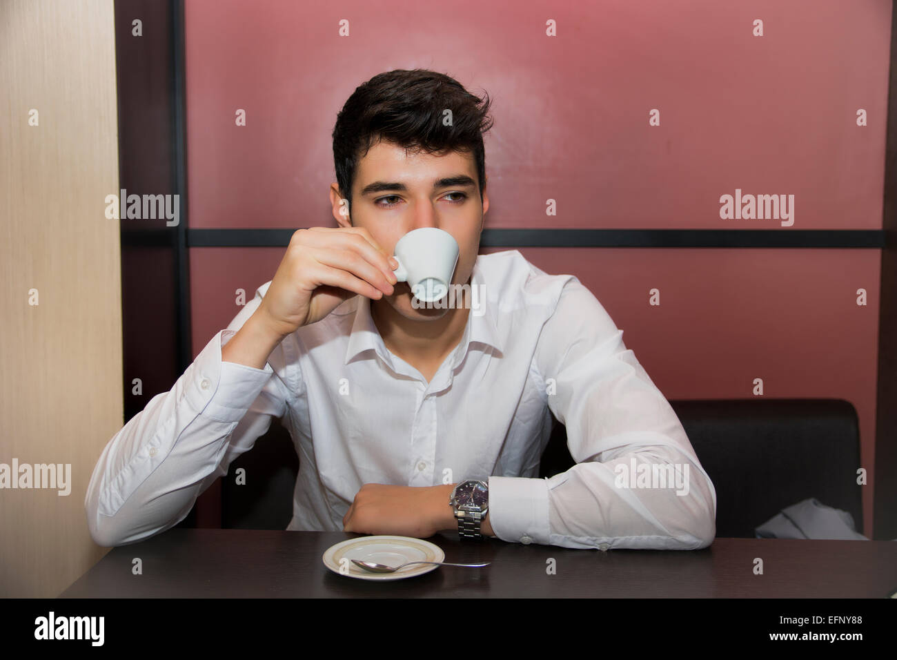 Stressed Handsome Man Having a Cup of Coffee at the Cafe Stock Photo ...