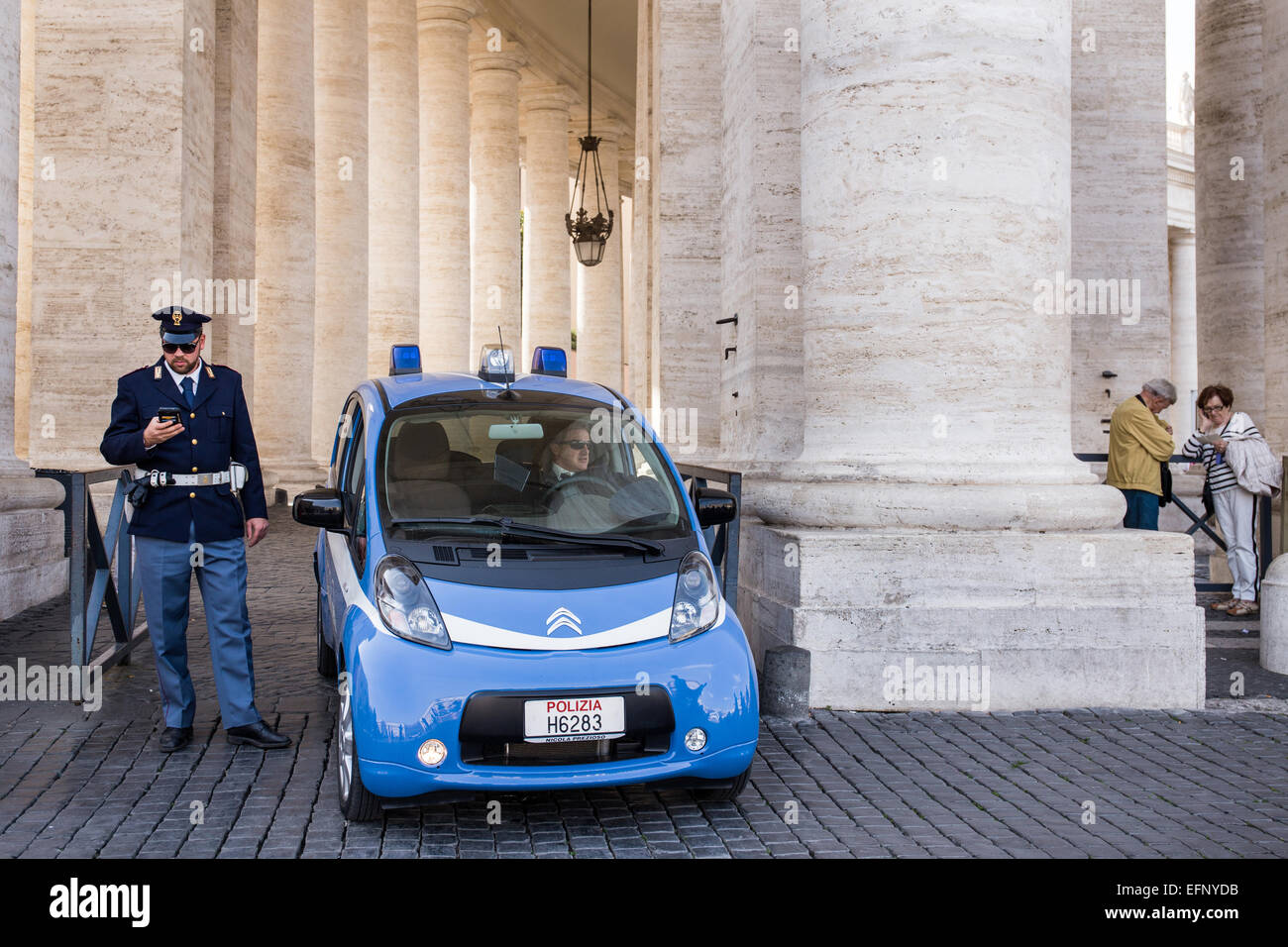 A small car Police on patrol with police man in the square in Vatican ...
