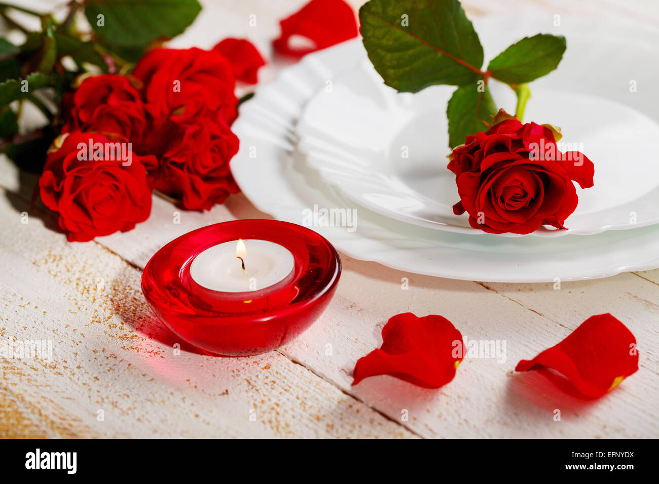 The perfect romantic dinner. Closeup of wooden table served with ...